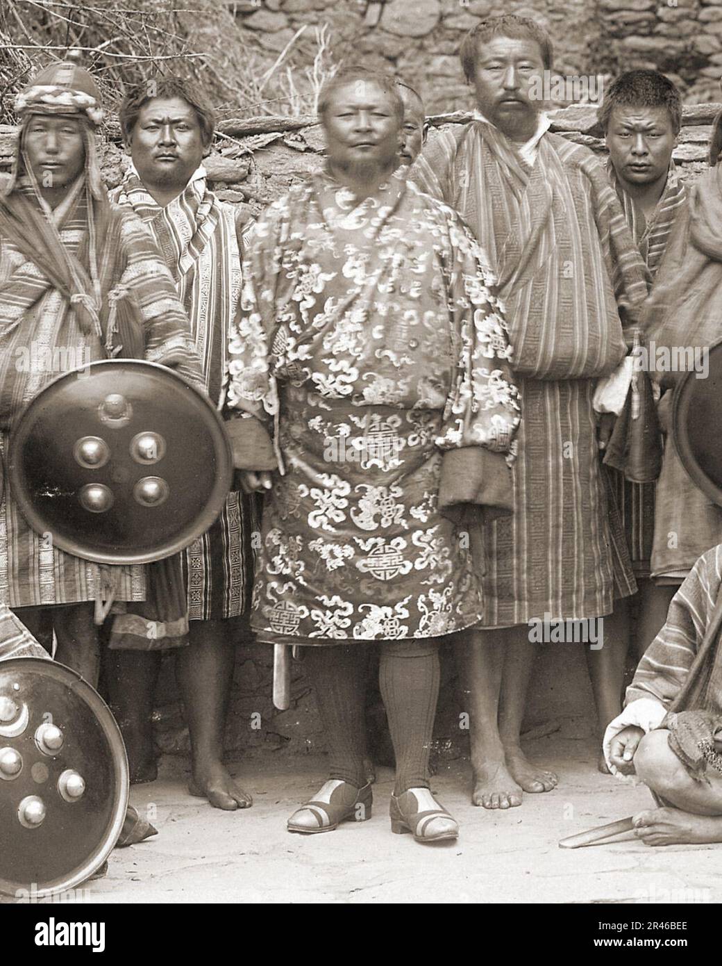 Ugyen Wangchuck in silk chuba with dragon and bat art detail, from- Sir ...