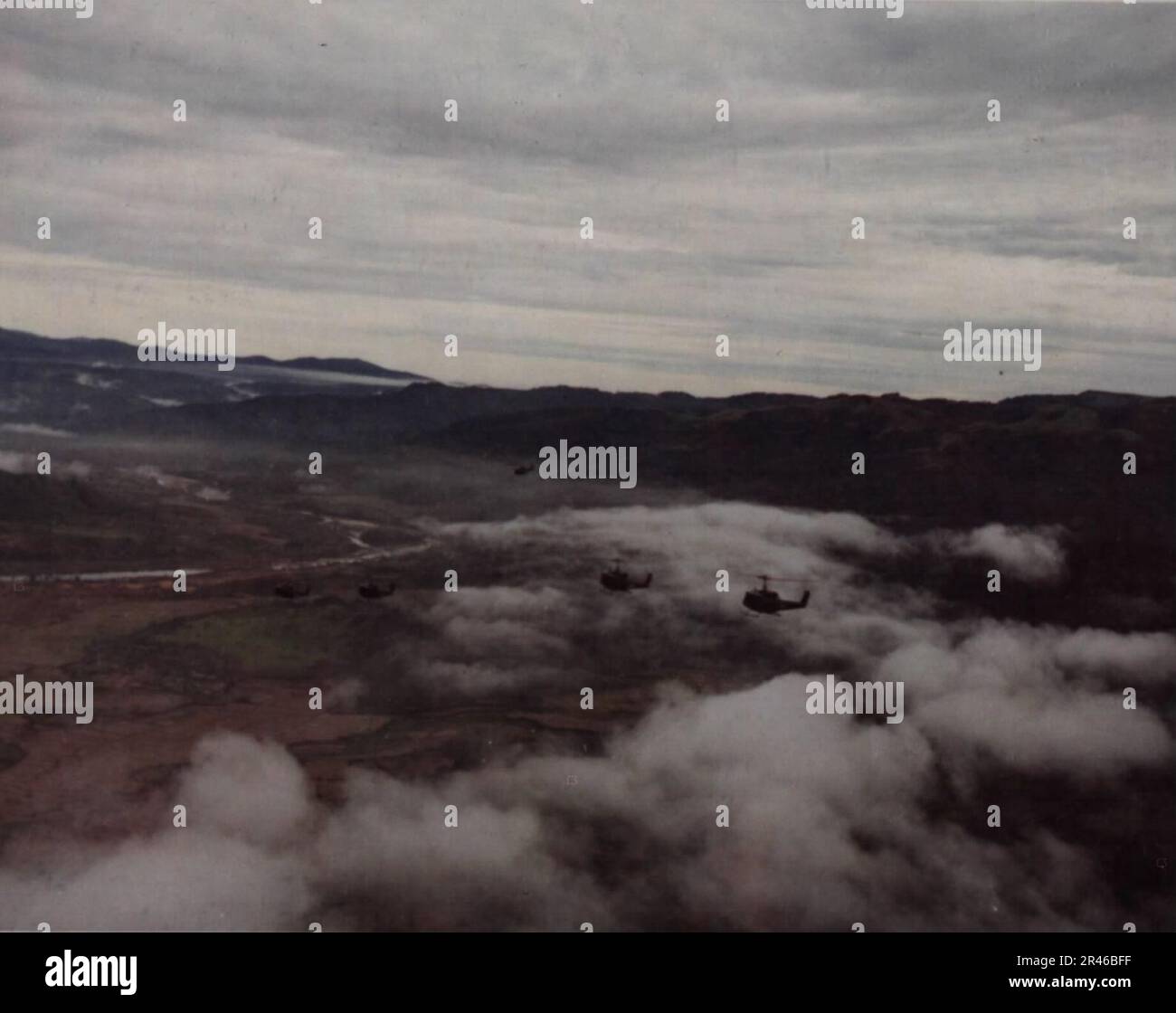 UH-1Ds of the 1st Squadron, 9th Cavalry conduct an air assault during ...