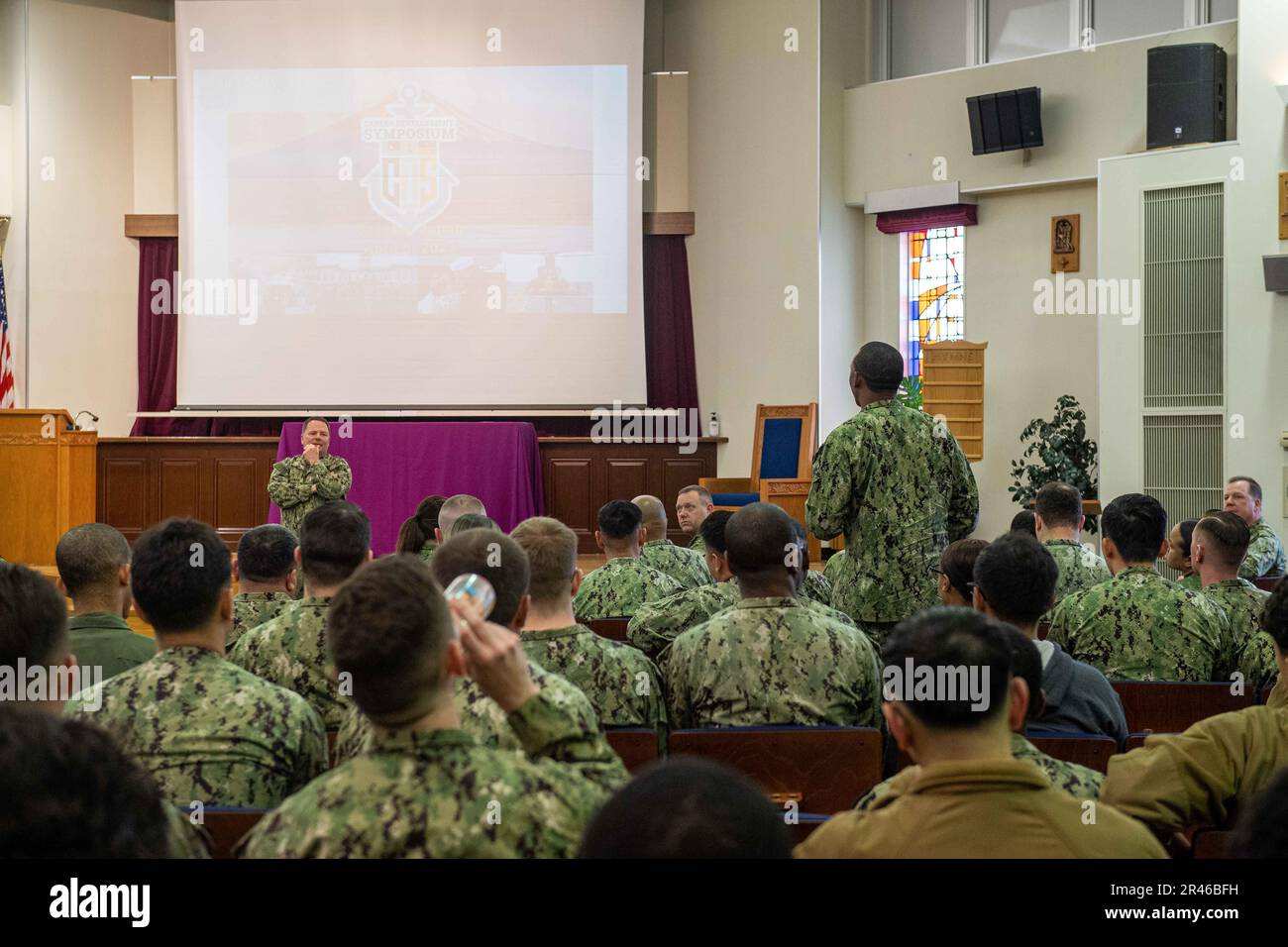 Vice Adm. Rick Cheeseman, Chief of Naval Personnel, listens as Sasebo ...