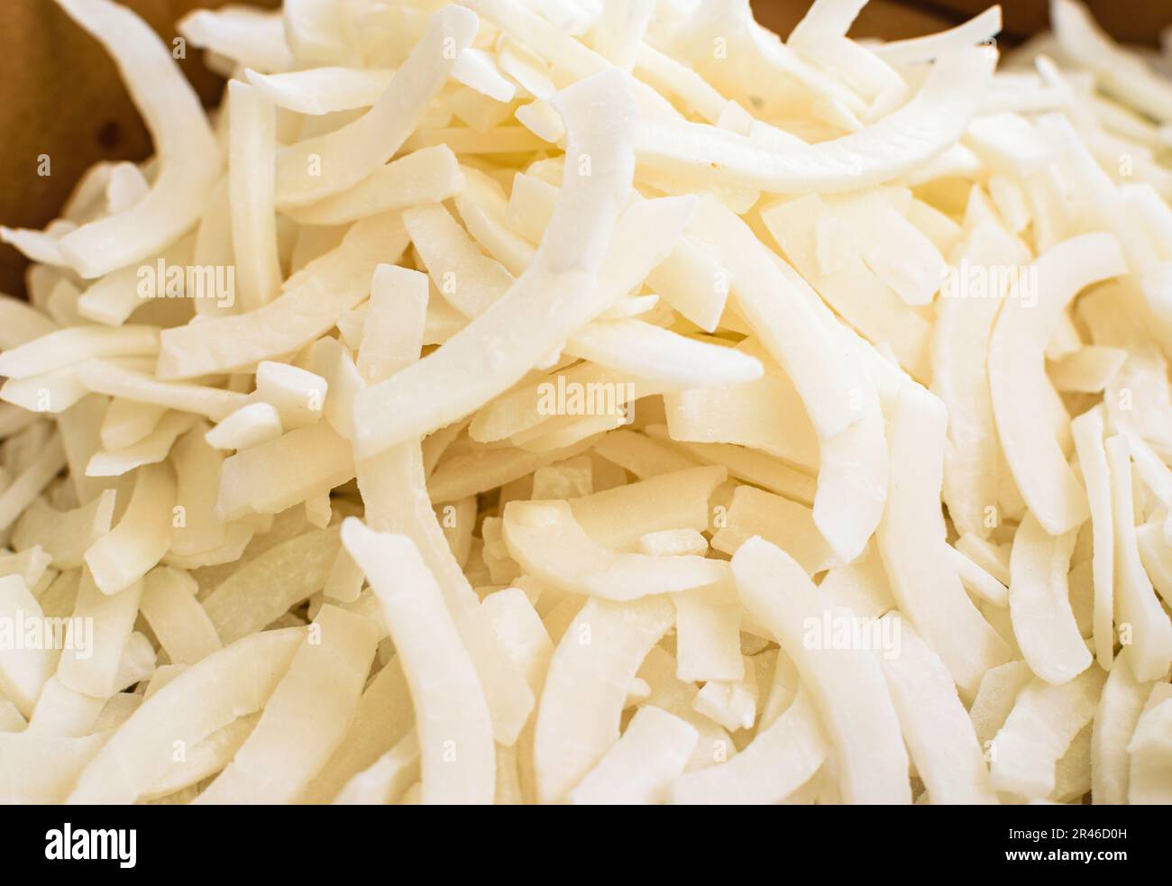 Image of dehydrated coconut strips stocked in market for consumption ...