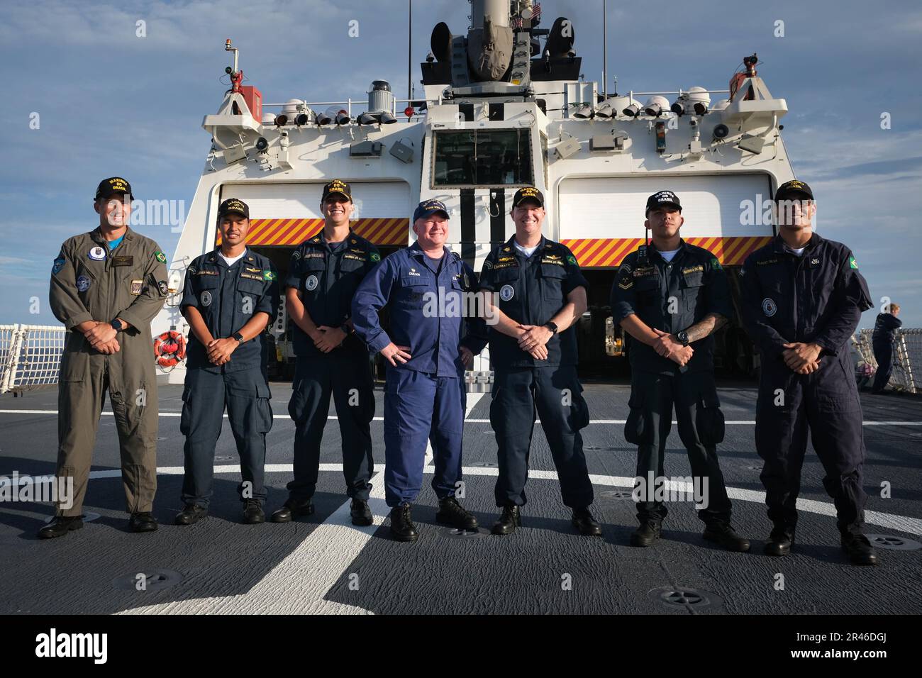 U.S. Coast Guard Capt. Clinton Carlson, middle, USCGC Stone's (WMSL 758 ...