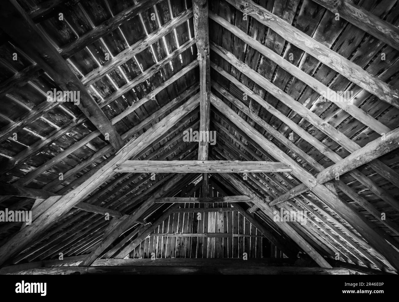 A small wooden structure with an intricate black and white patterned ...