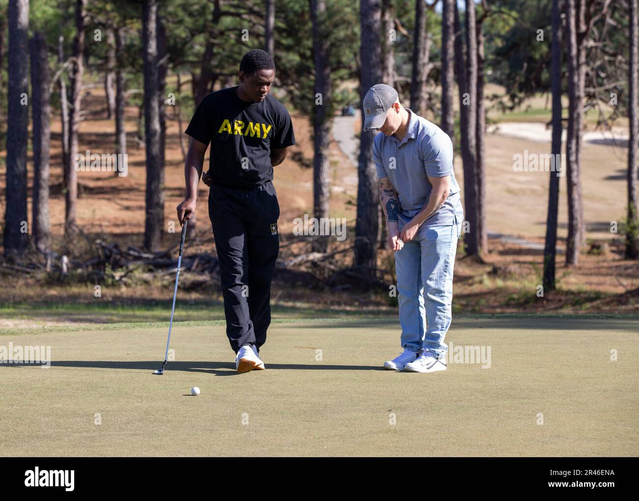 U.S. Army Spc. Micheal, Raiford Left, and Sgt. Anthony, Hopper practice ...