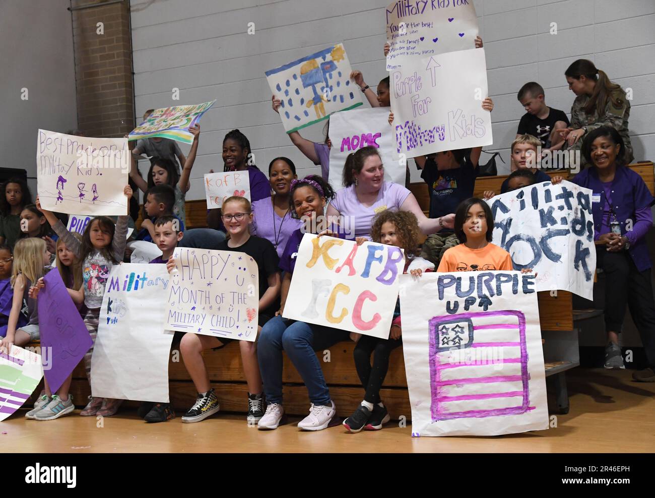Keesler children display posters during a pep rally inside the Youth ...