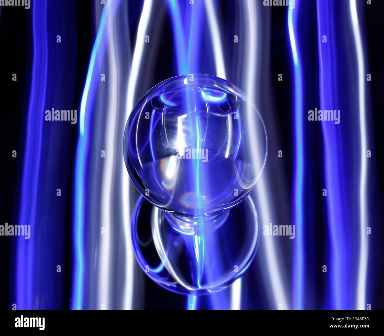 An intriguing blue and white light emanating from a light bulb in a ...