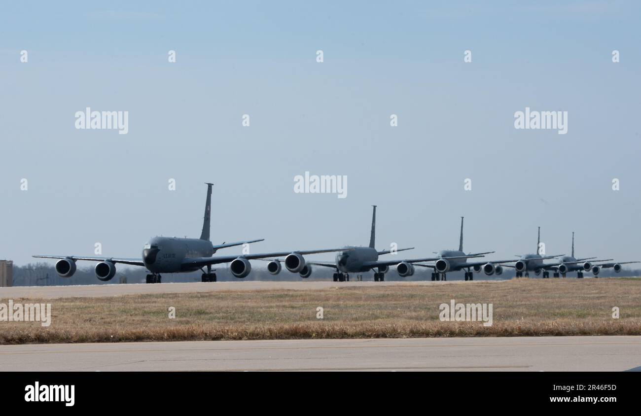 Five KC-135 Stratotankers taxi on a runway for an elephant walk during ...