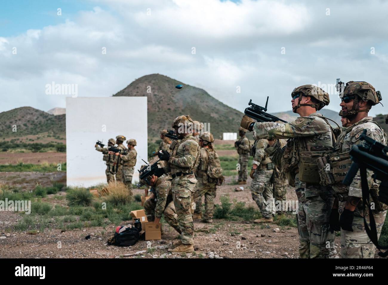 U.S. Army soldiers assigned to Task Force Wolfhound fire M320 grenade ...