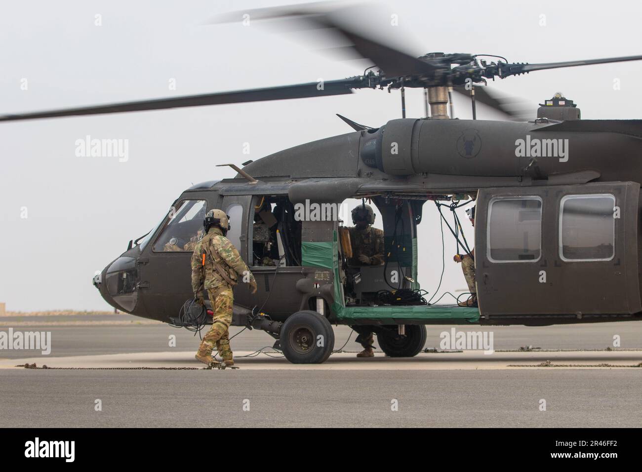 Flight crews from Task Force Spartan prepare their UH-60 Black Hawk ...