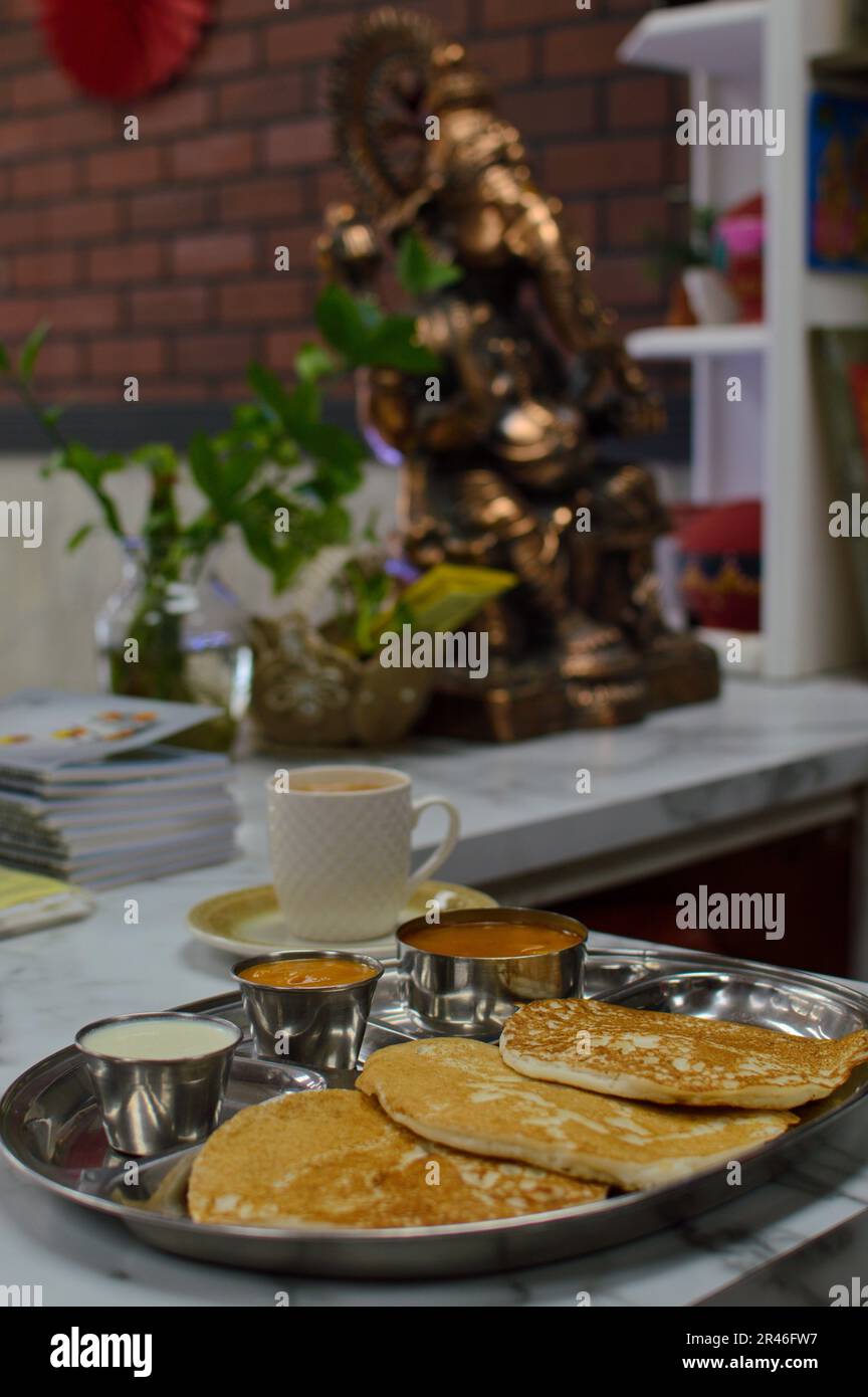 A delicious South Indian meal spread, featuring mini uthappam, coconut ...