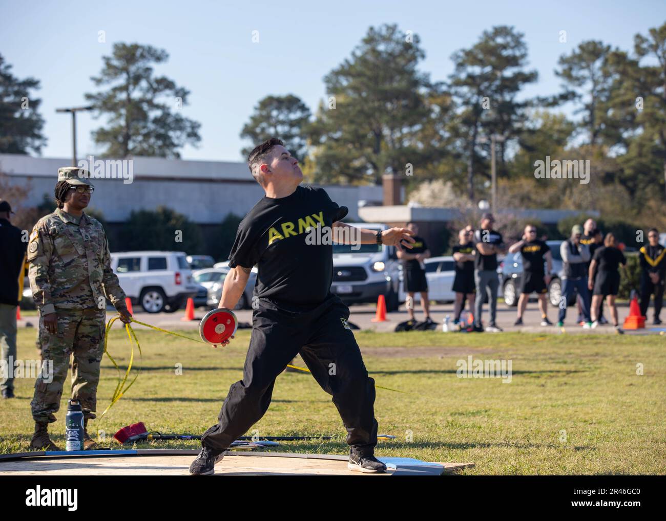 U.S. Army Sgt. Dalton, Apodaca throwing discus during the U.S. Army ...