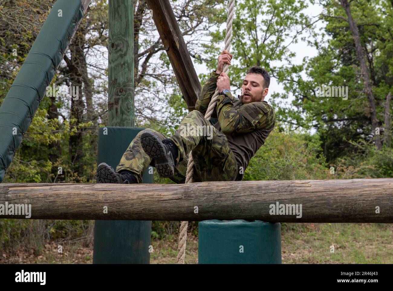 Czech Armed Forces Staff Sgt. Maxim Mojžíš maneuvers through the ...