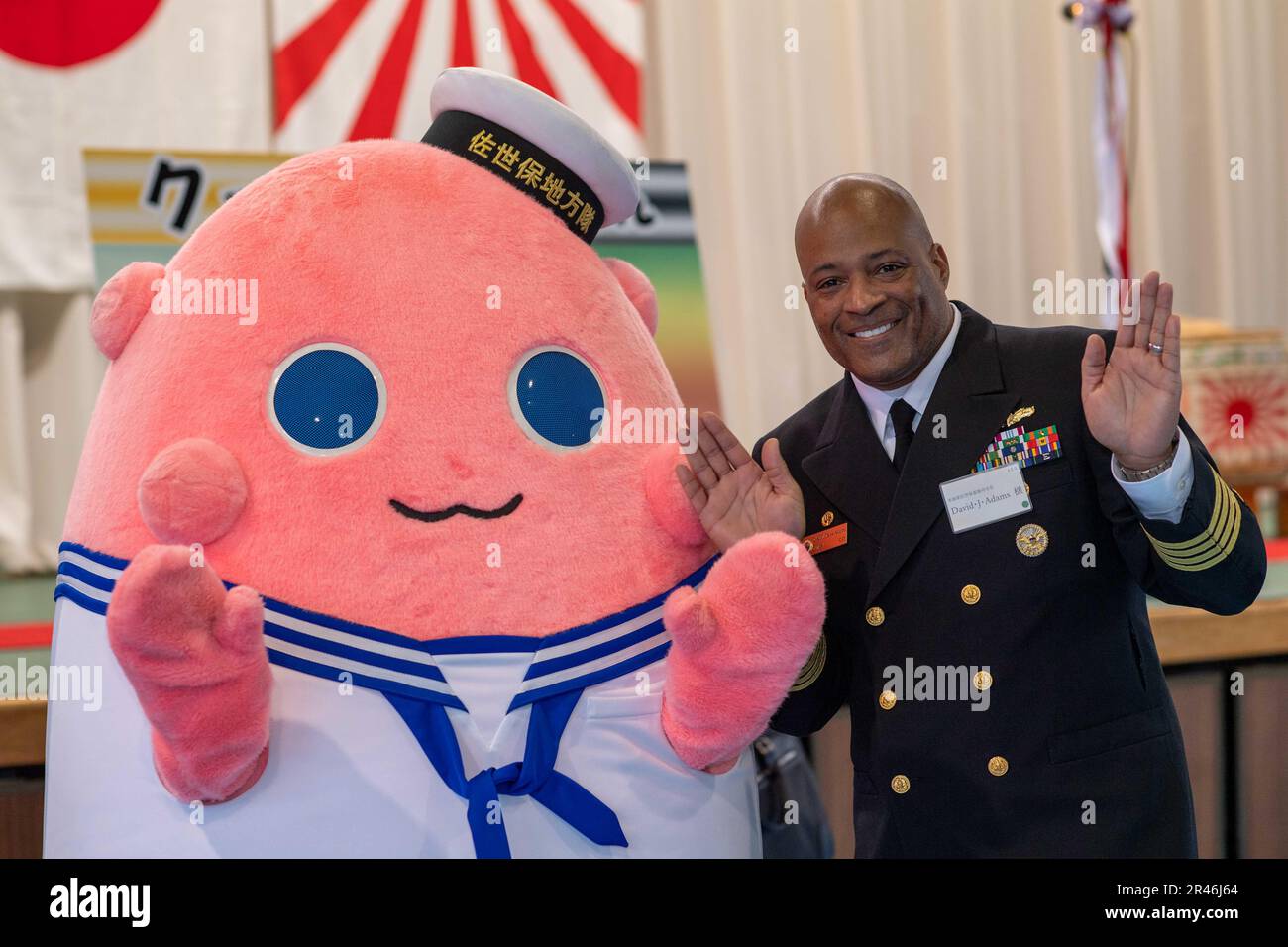 Capt. David Adams, Commander, Fleet Activities Sasebo (CFAS), poses for ...