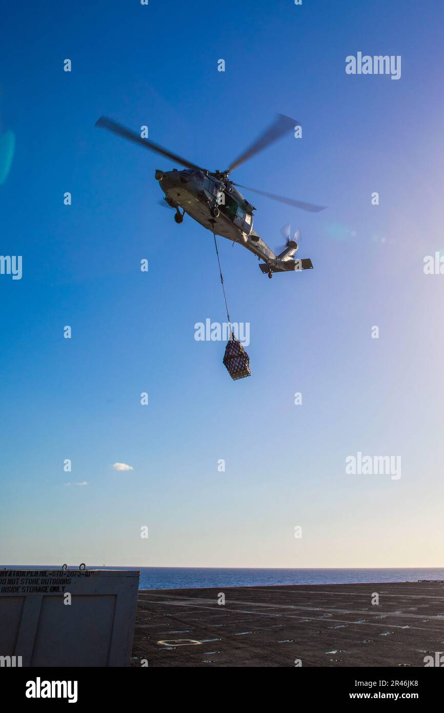 230122-UI066-1142 IONIAN SEA (Jan. 22, 2023) An MH-60S Nighthawk ...