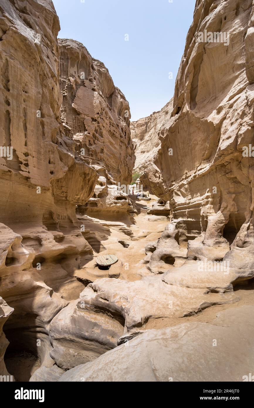 Tourists Explore Chahkuh Valley on Qeshm Island in Iran, a geosite ...
