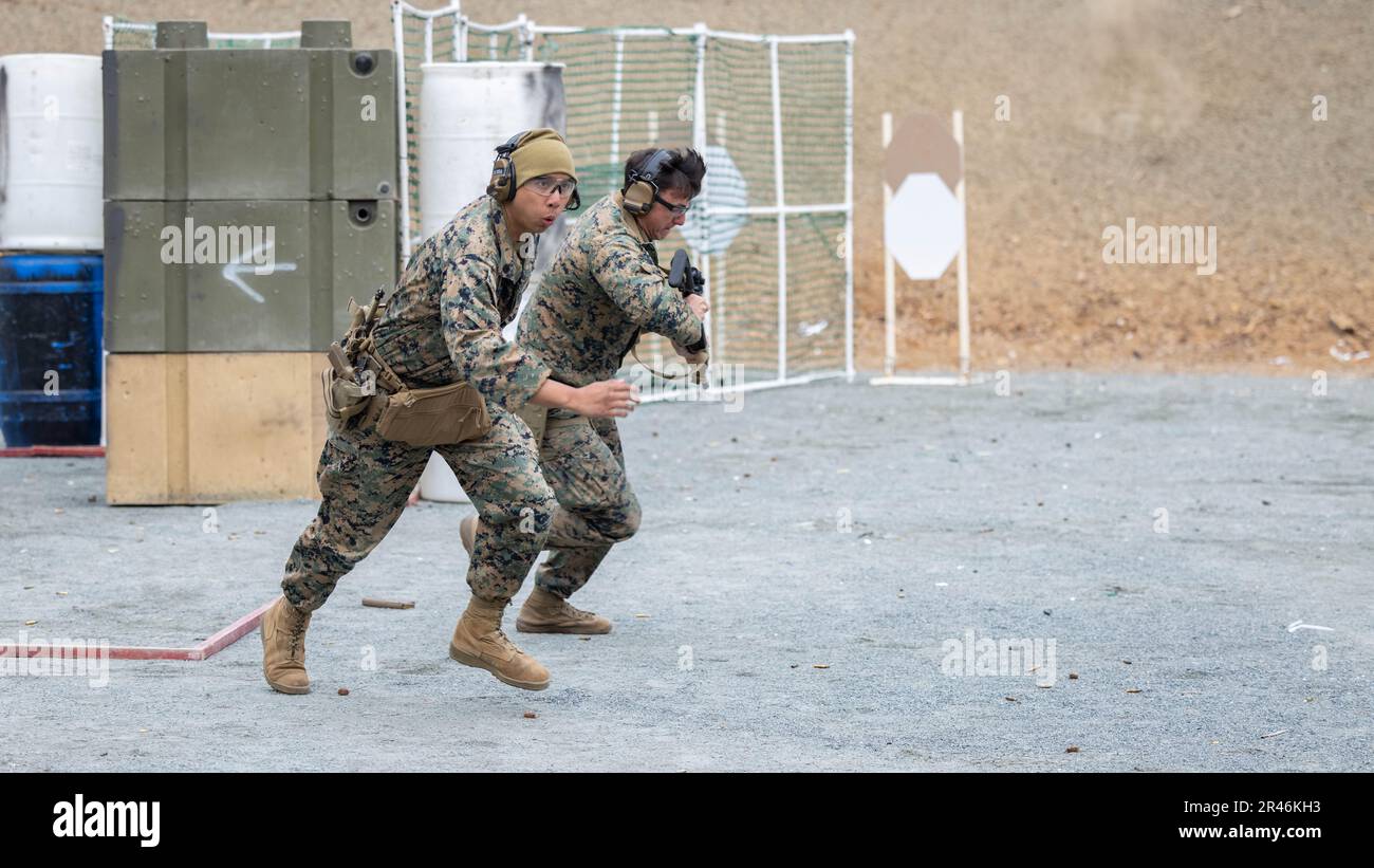 U.S. Marine Corps Staff Sgt. Christiano Cachola, a small arms weapons ...