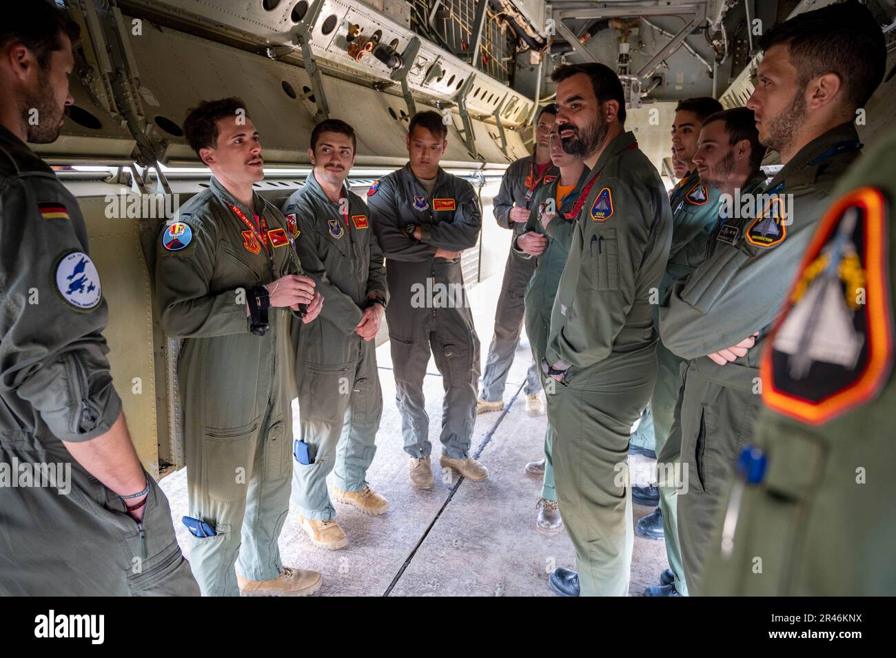 Members of the 23rd Expeditionary Bomb Squadron provide members of the ...