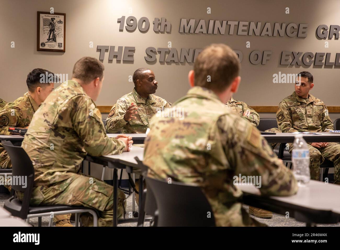 U.S. Air Force Chief Master Sgt. Maurice L. Williams, center, command ...