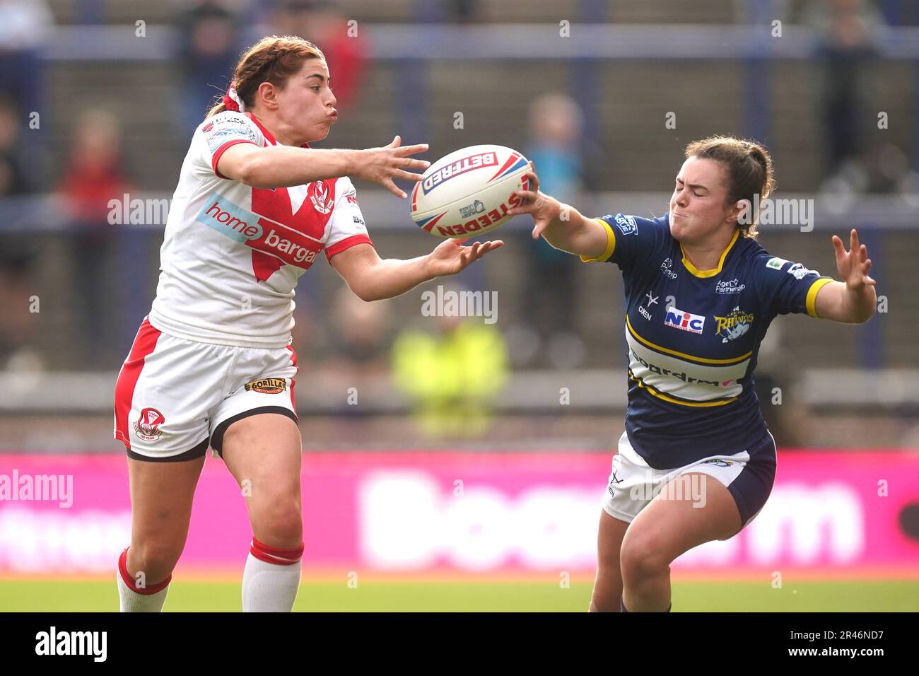 St Helens' Emily Rudge (left) and Leeds Rhinos' Eloise Hayward in ...