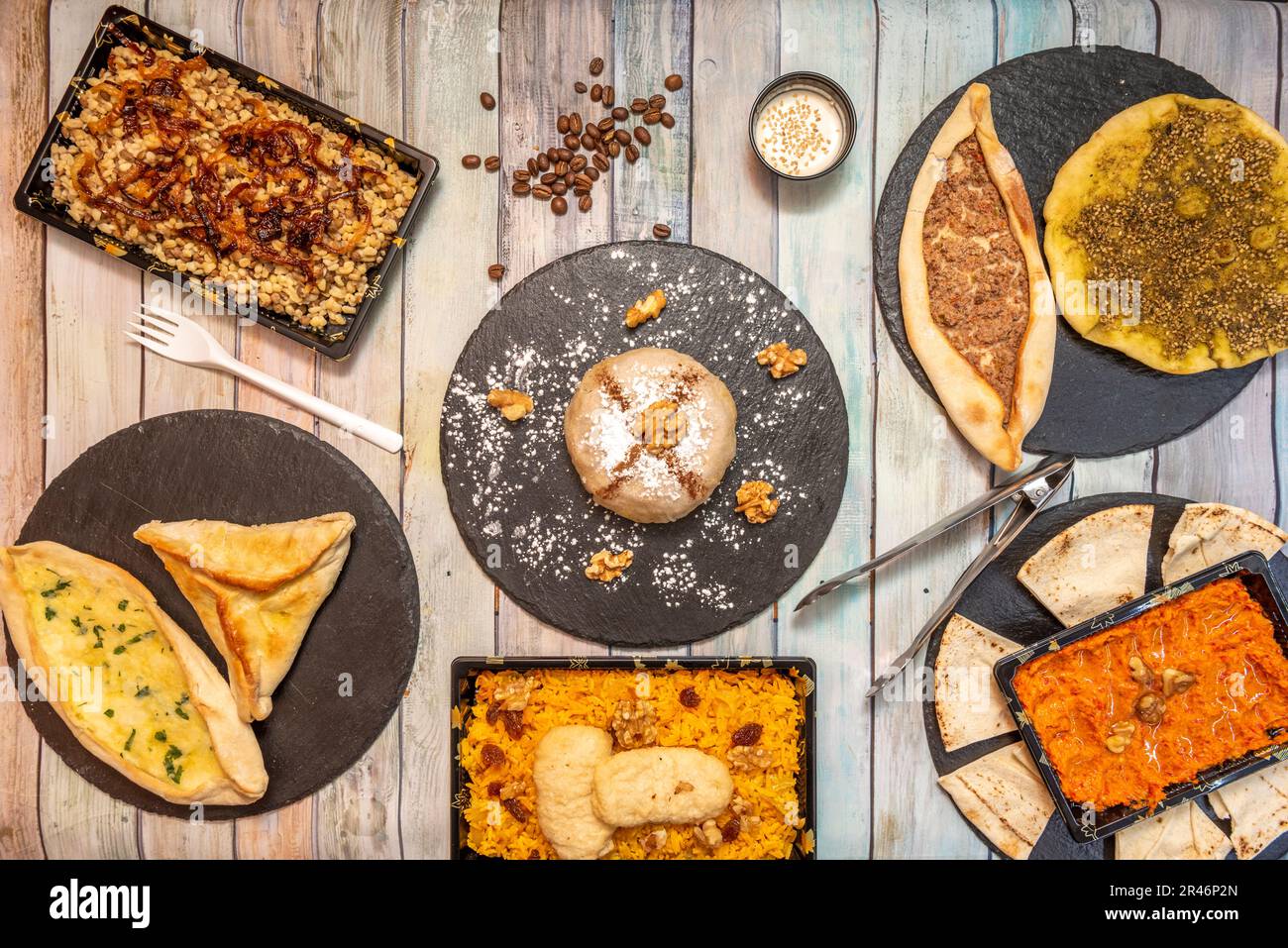 Middle eastern food dish set with turkish pizza, flatbreads and hummus ...