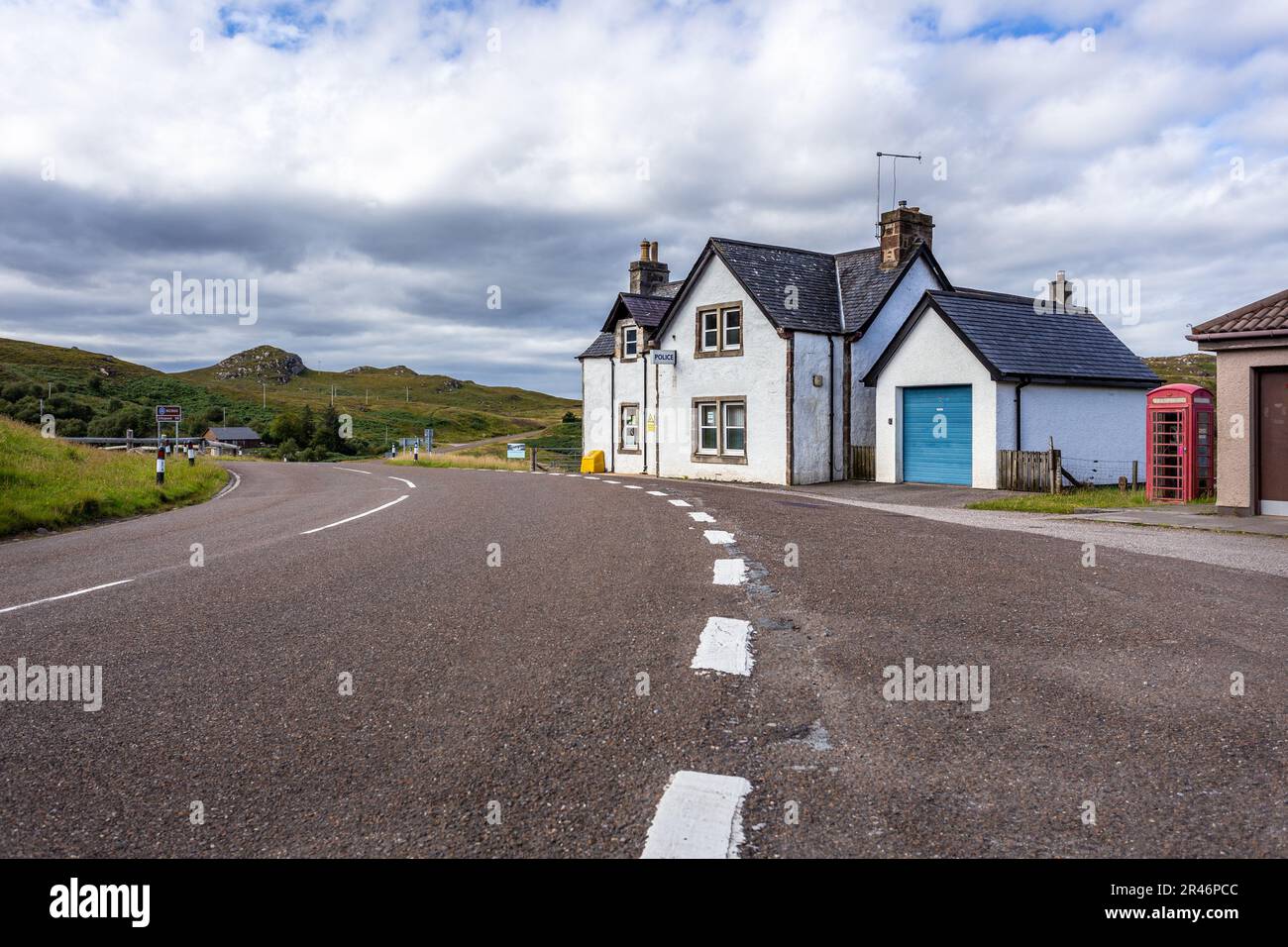 A peaceful country road weaving through a quaint village of traditional ...