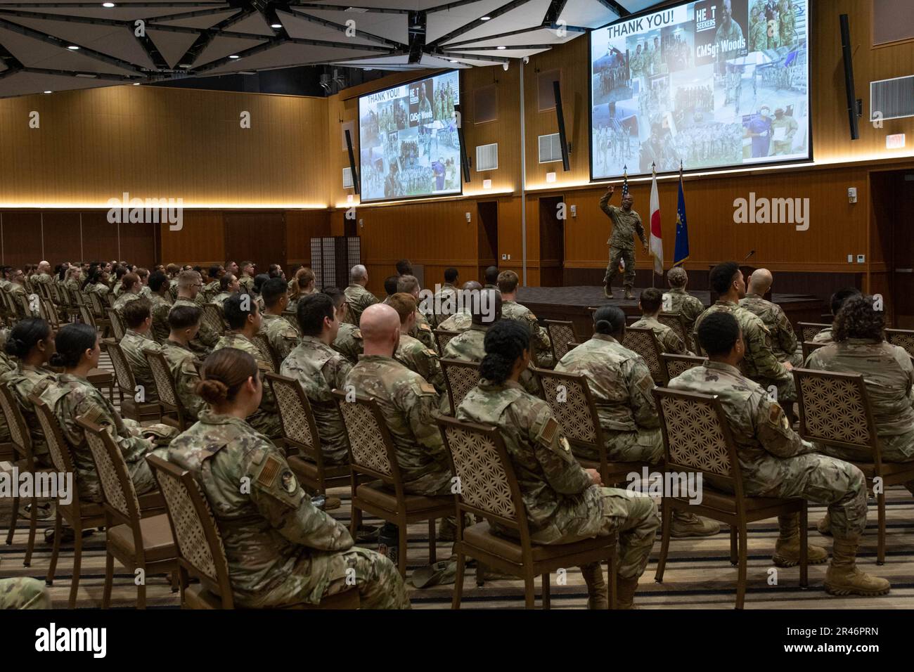 Chief Master Sgt. Ronnie Woods, 18th Wing command chief, gives his ...
