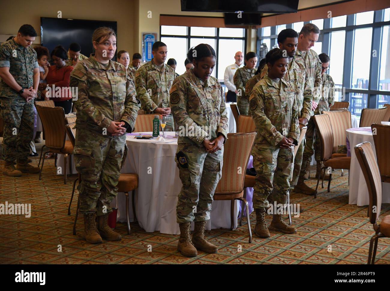 Keesler personnel bow their heads during the invocation during the ...