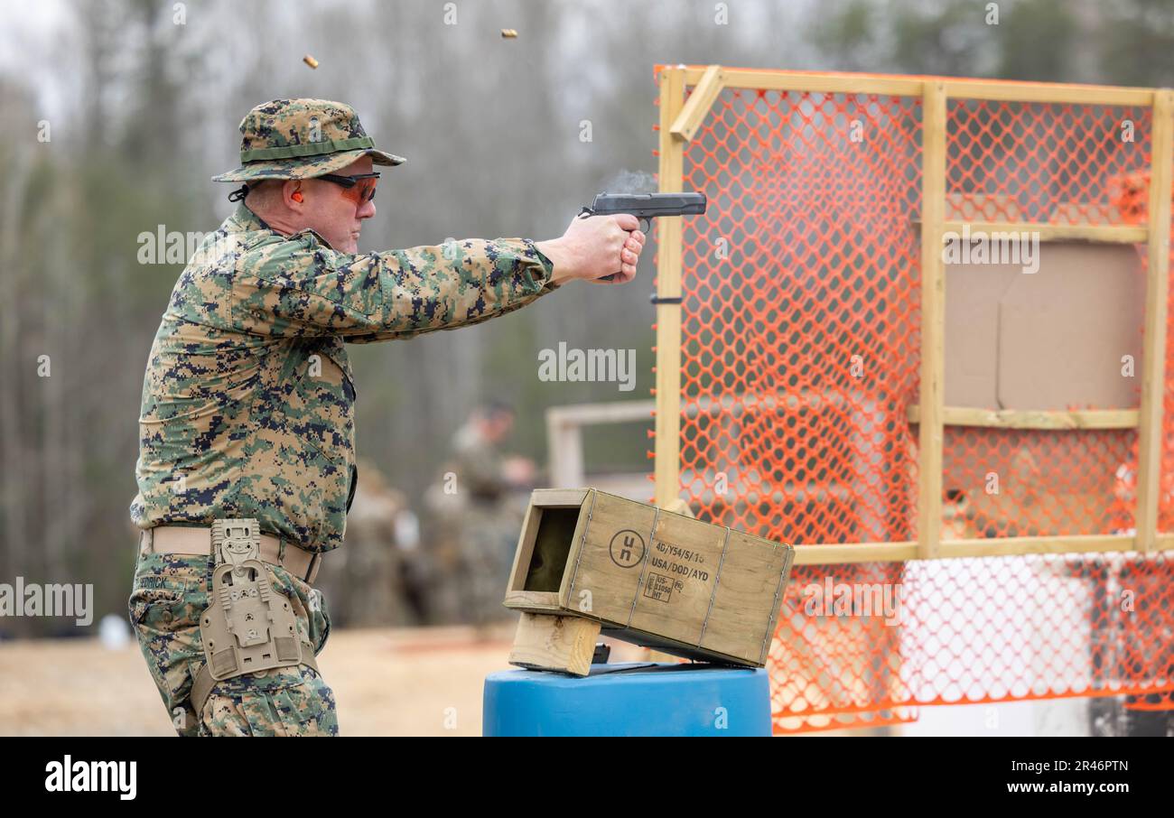 U.S. Marine Corps Master Sgt. Jason Hedrick, a marksmanship instructor ...