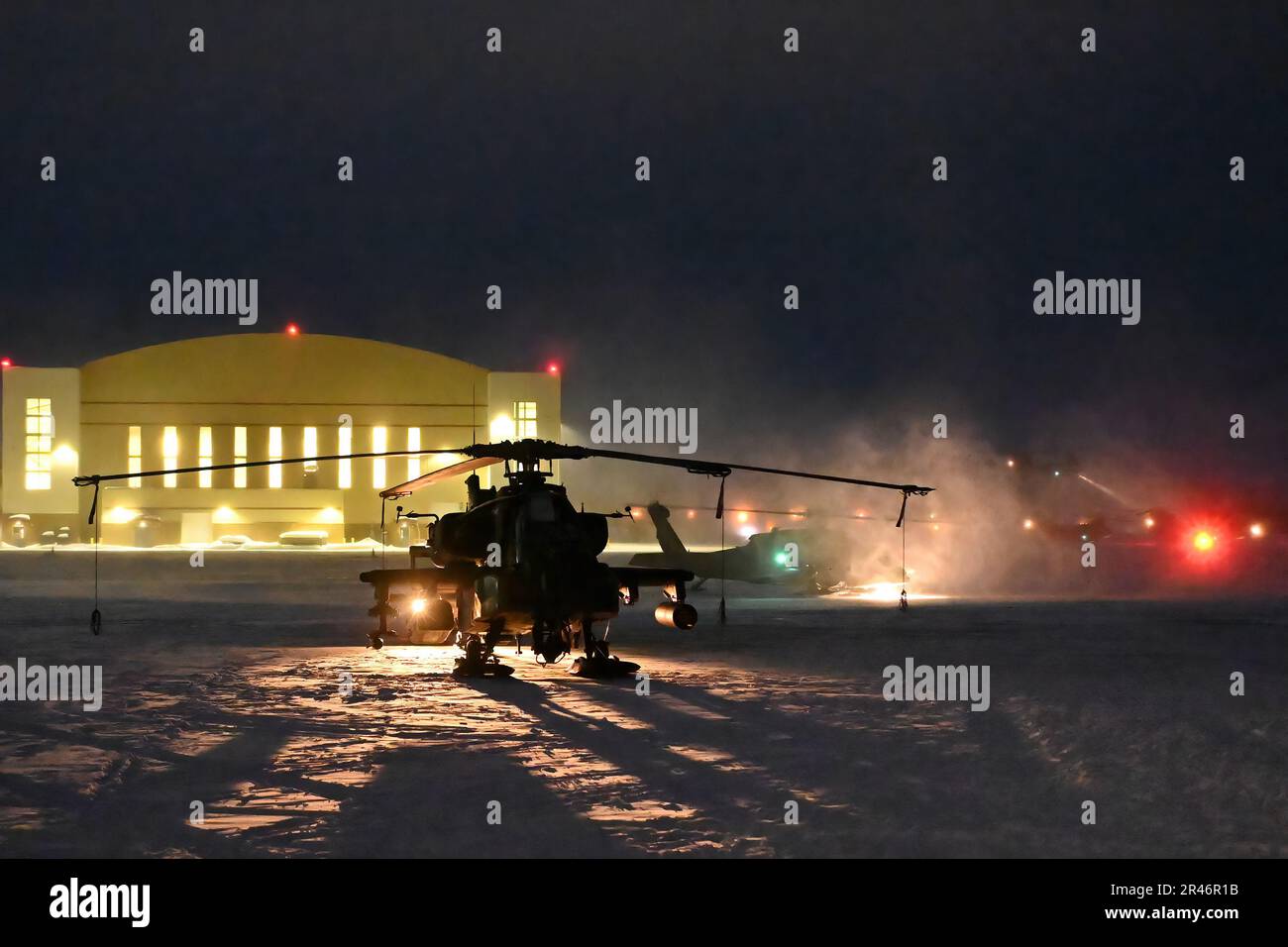 Aviation crews prepare to move an AH-64 Apache helicopter from the 1st ...