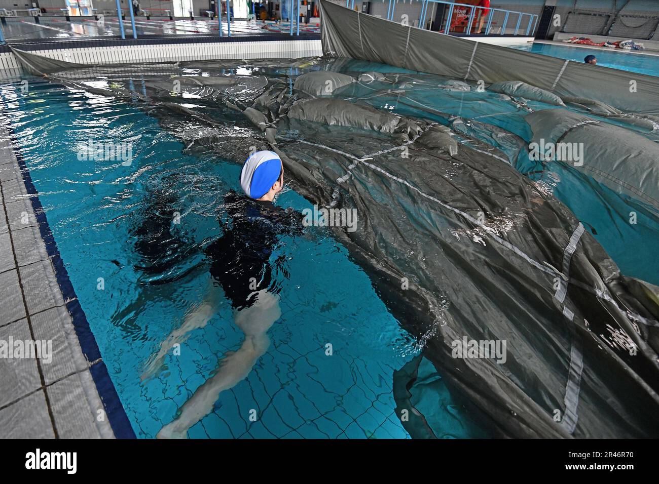 U.S. Army Paratroopers assigned to the 173rd Airborne Brigade, swim ...