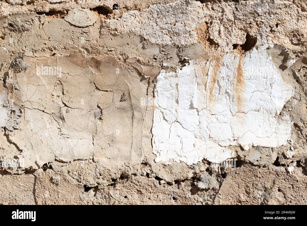 Bicolour texture of wall of abandoned house in village Stock Photo - Alamy