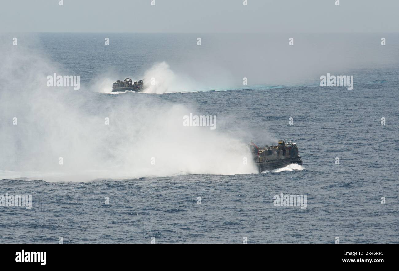 230215-N-WM182-2071 SOUTH CHINA SEA (Feb. 15, 2023) Two landing craft ...