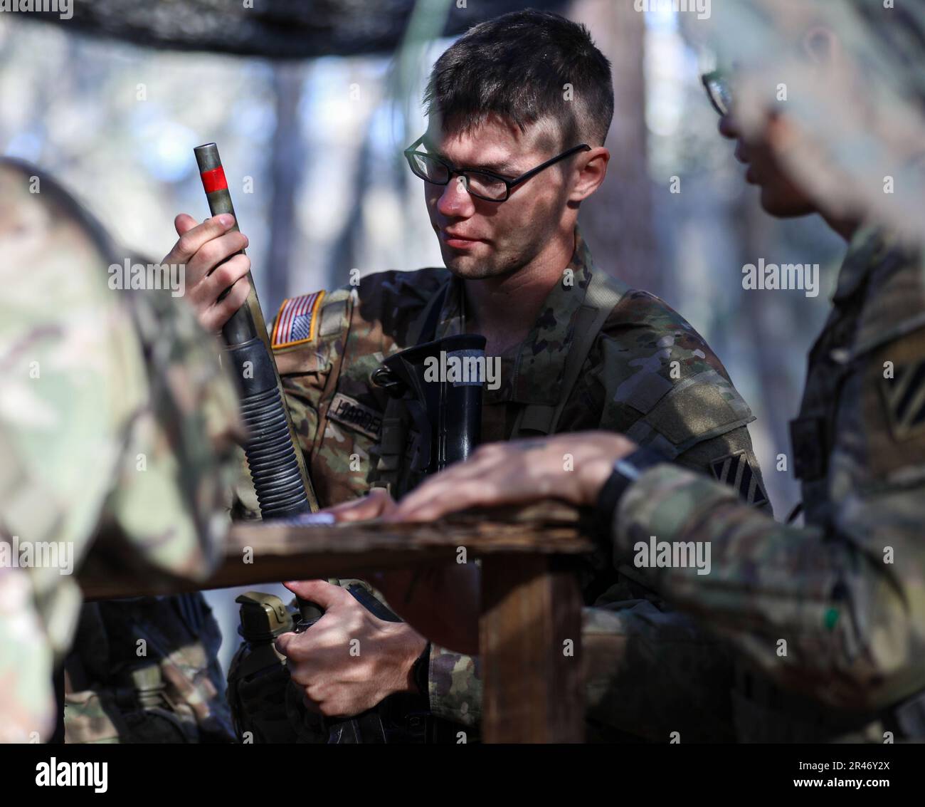 A soldier assigned to the 3rd Infantry Division learns the functions of ...