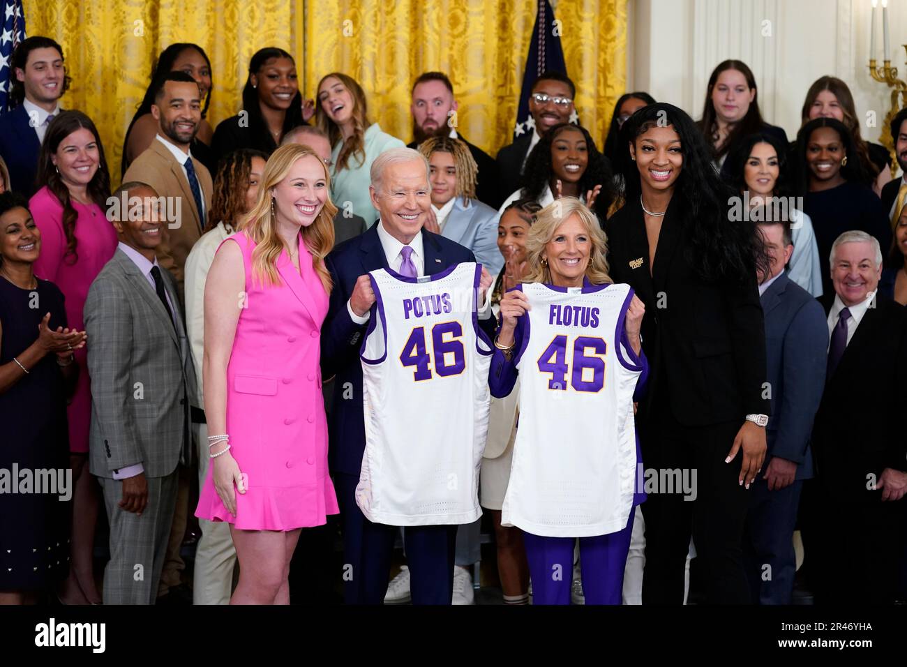 President Joe Biden and first lady Jill Biden are presented with ...