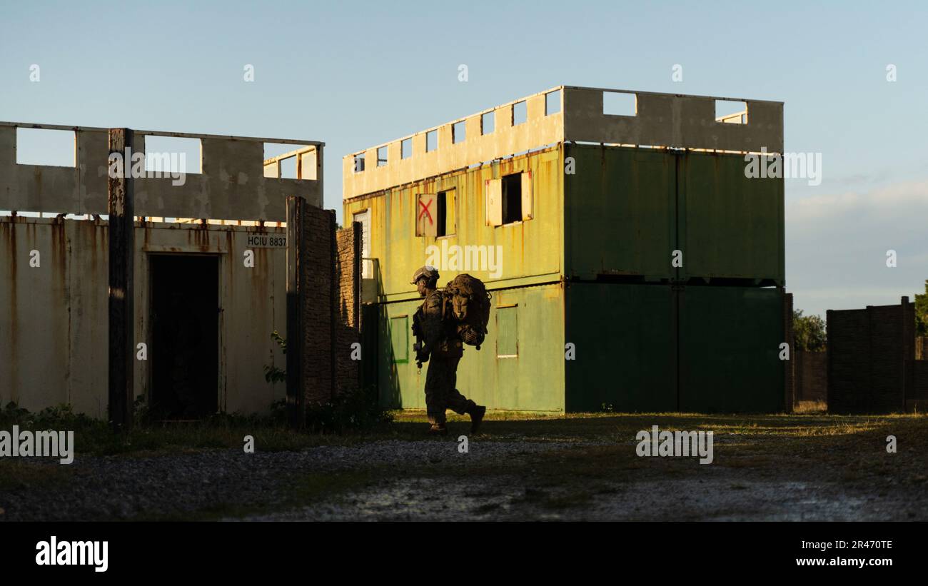 A U.S. Marine with 1st1st Battalion, 7th Marines moves to a defensive ...
