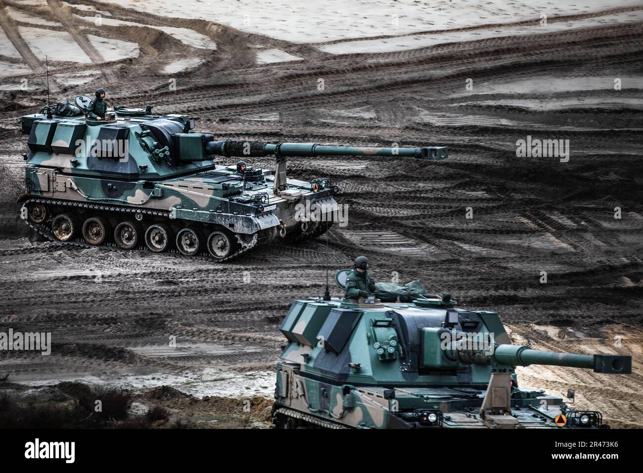 Polish soldiers assigned to the 14th Artillery Battalion, 21st Brigade ...