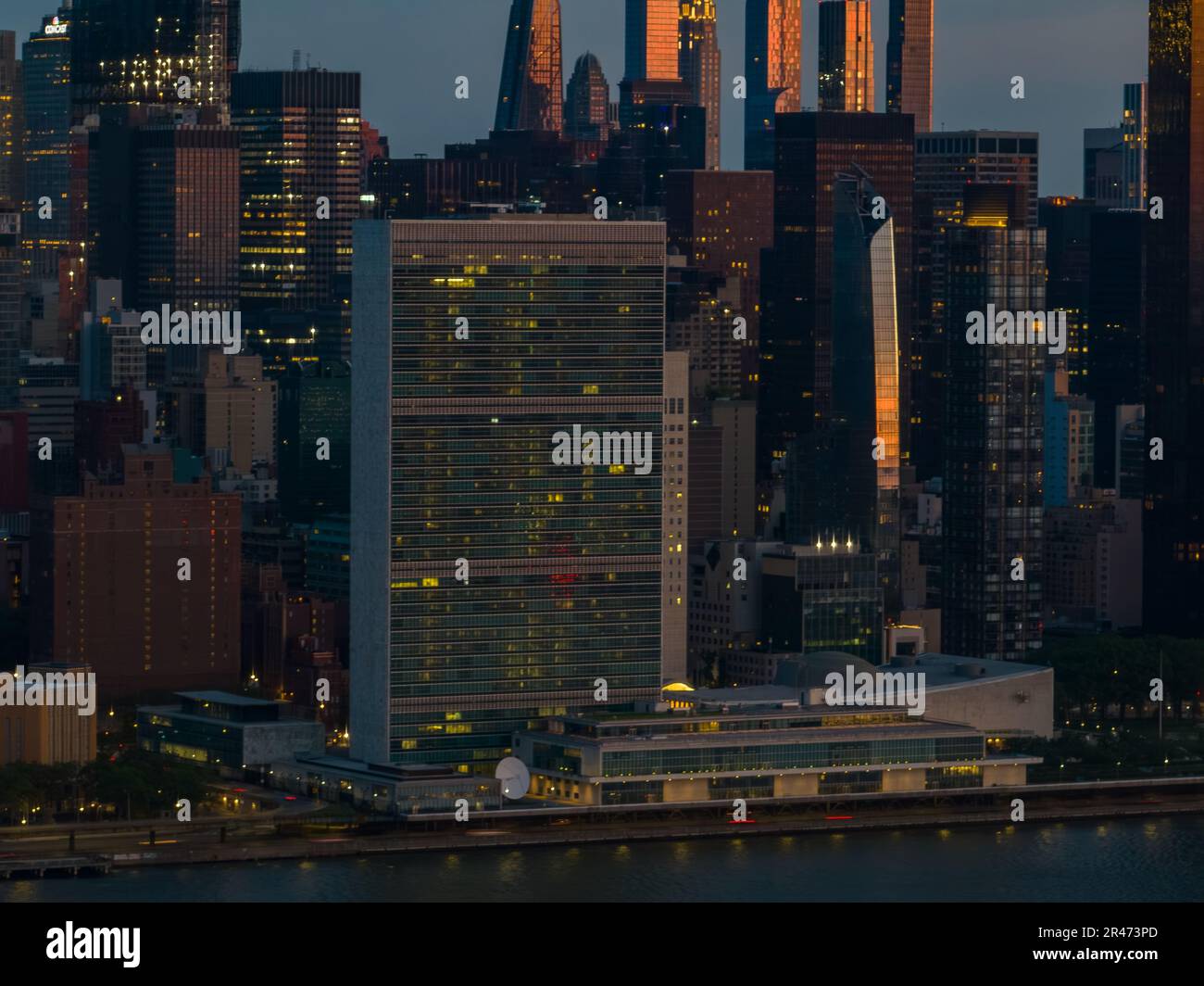 An aerial view of the New York skyline at sunrise with tall skyscrapers ...