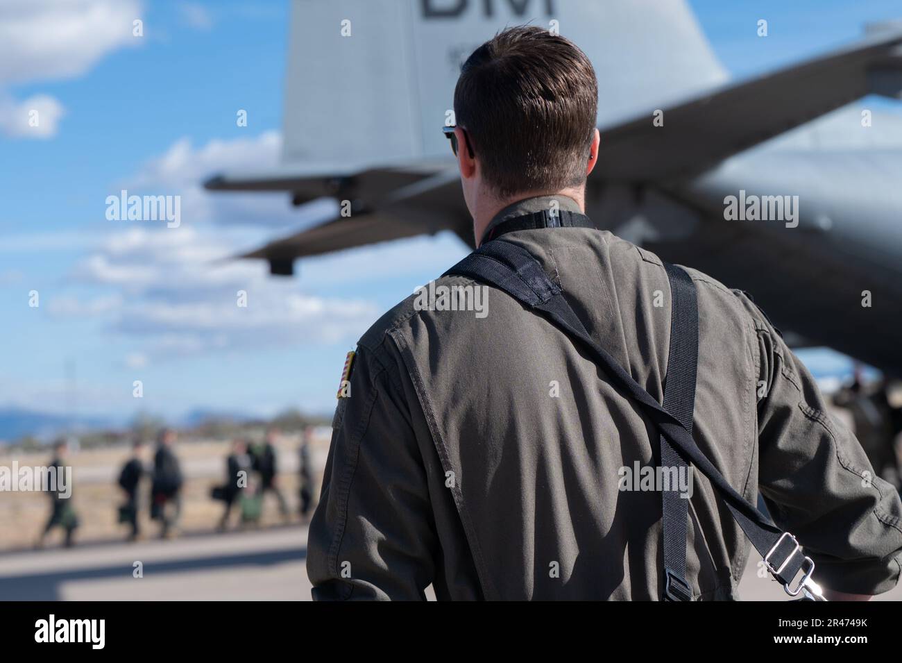 Aircrew from the 43rd Electronic Combat Squadron walk towards an EC ...