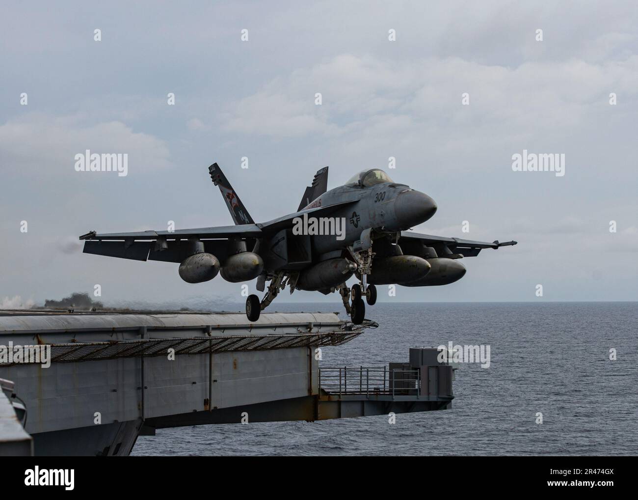230212-N-MH015-1015 SOUTH CHINA SEA (Feb. 12, 2023) An F/A-18E Super Hornet from the “Kestrels ...