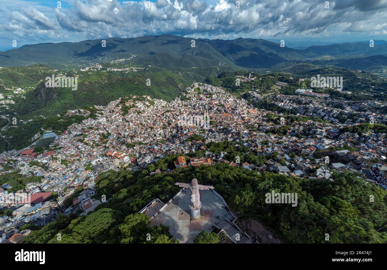 An aerial view of a vibrant cityscape, with high-rise buildings in ...