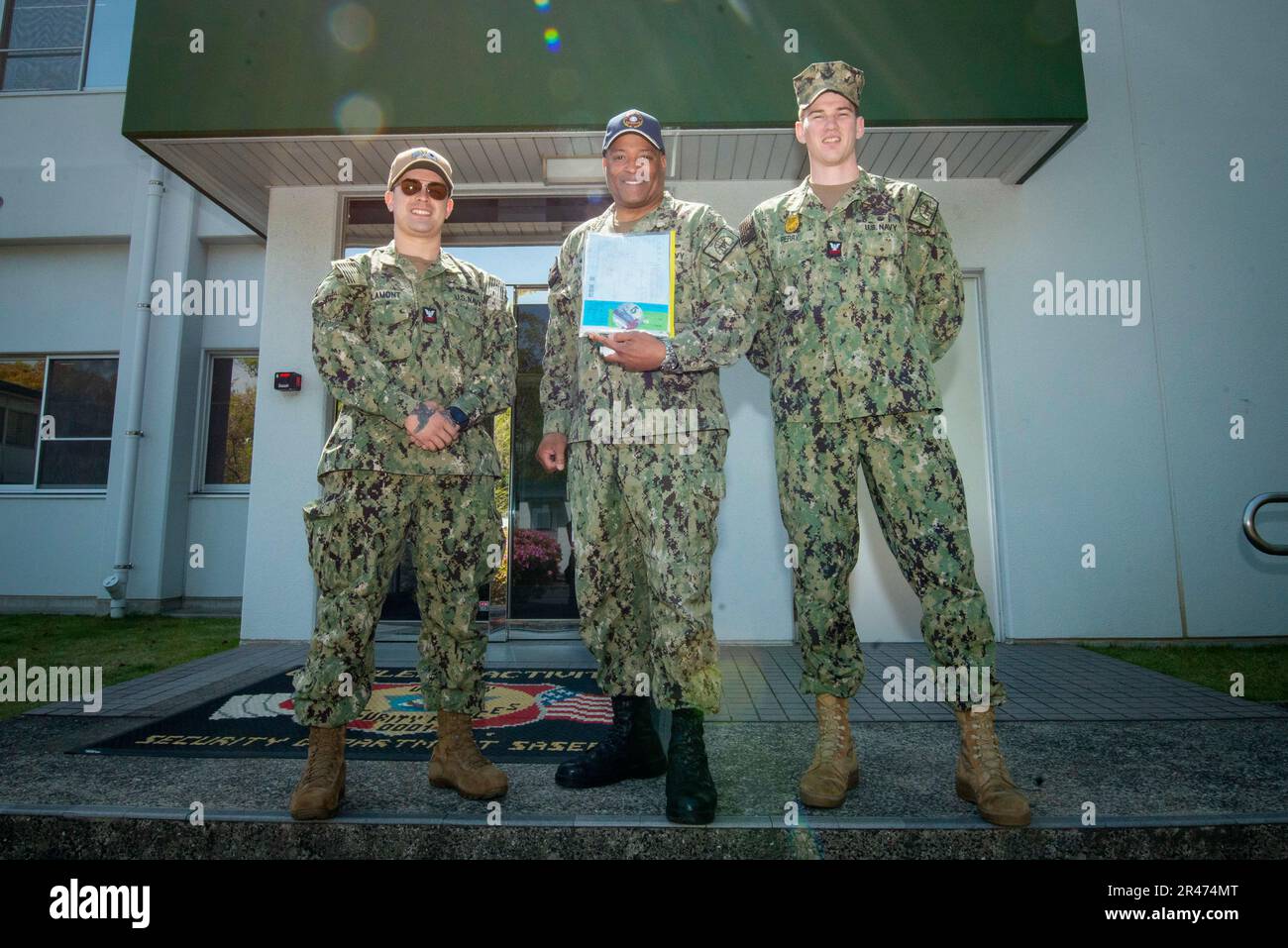 Capt. David Adams, Commander, Fleet Activities Sasebo (CFAS), poses for ...