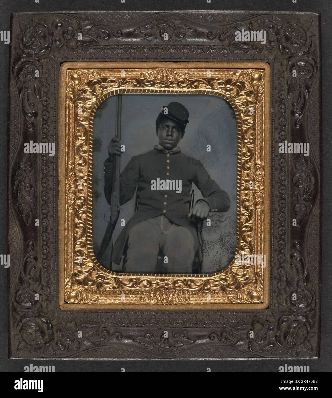 Unidentified African American soldier in Union sergeant uniform holding ...