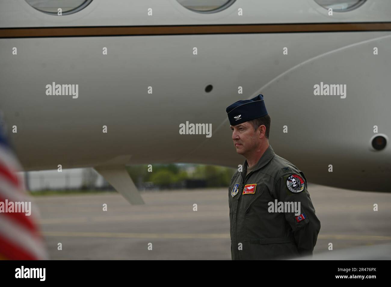 Col. Ted Geasley, 118th Wing Commander, awaits the arrival of Vice President Kamala Harris at ...