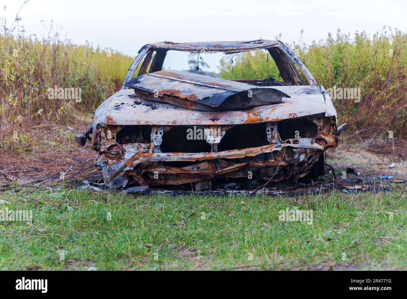 A burnt-out car. Car old burned by fire. Fire burned car Stock Photo ...