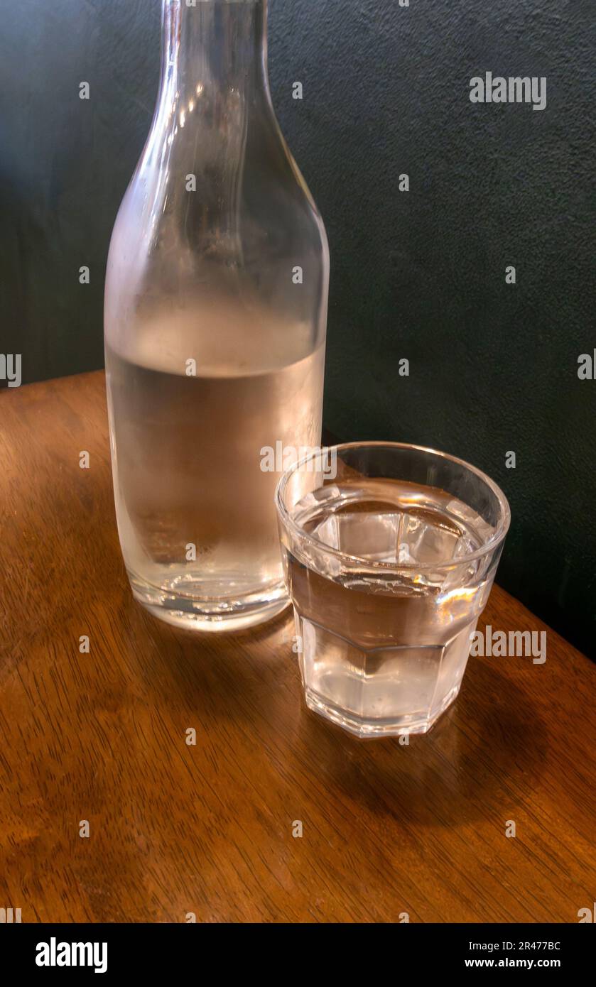 H2O fresh cold water bottle and glass Stock Photo - Alamy