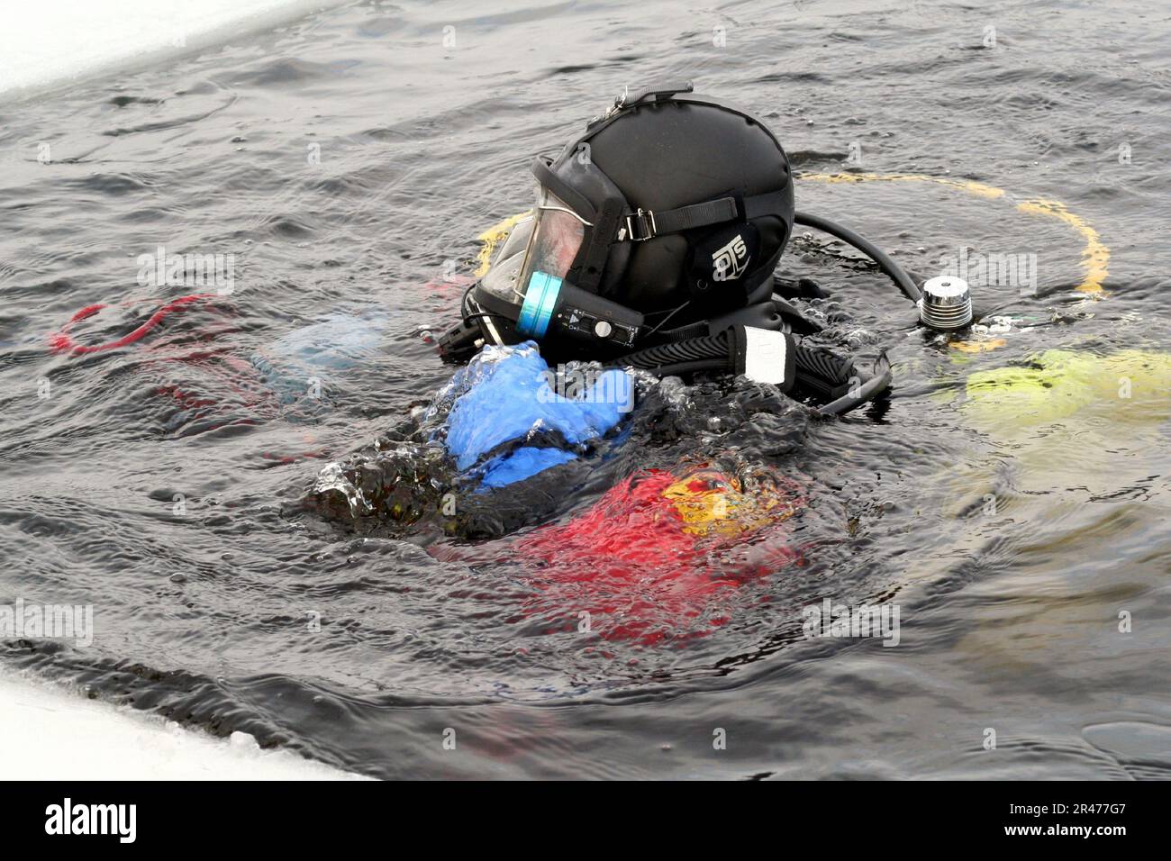 A firefighter with the Directorate of Emergency Services Fire ...