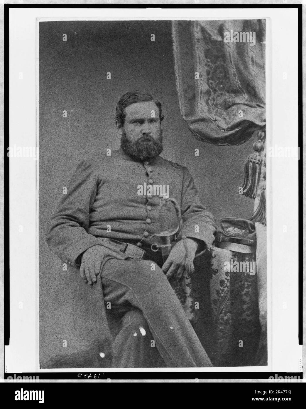 Unidentified officer, three-quarter length portrait, seated, with left ...