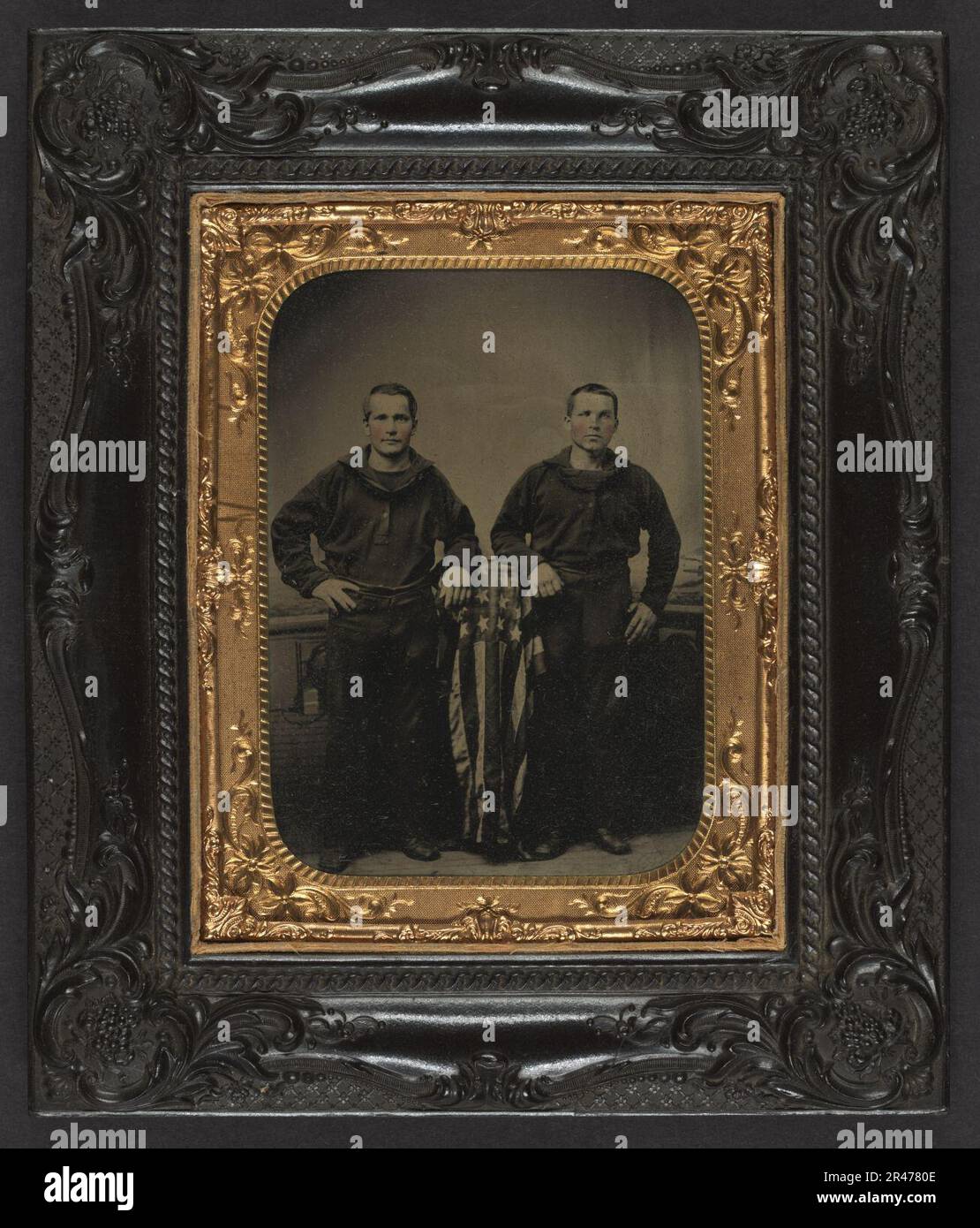 Unidentified sailors in Union uniforms with American flag in front of ...