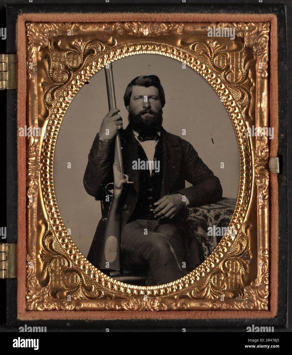 Unidentified soldier in Confederate uniform with converted Model 1817 ...