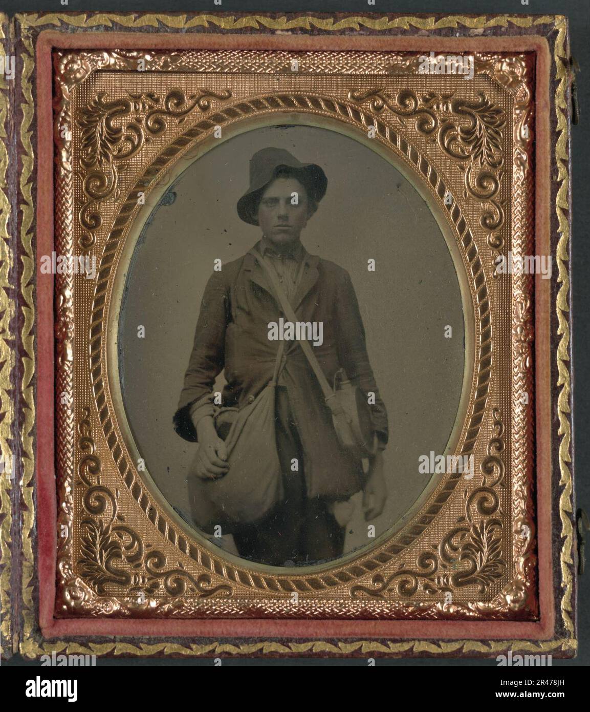 Unidentified soldier in Confederate uniform with Gardner patent canteen ...