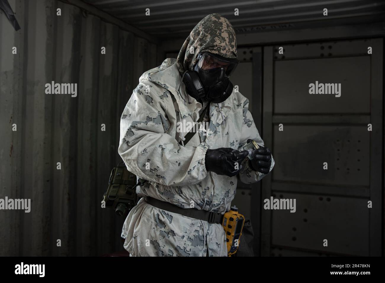 U.S. Marine Corps Cpl. Justin Dickison, a chemical, biological ...